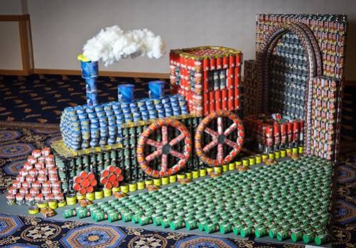 Solve Canstruction train jigsaw puzzle online with 60 pieces