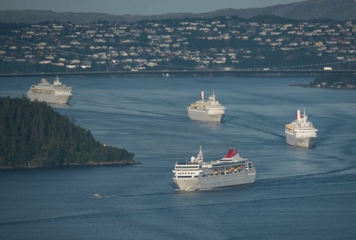 Solve Four Fred Olsen ships in Bergen jigsaw puzzle online with 24 pieces
