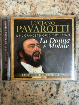 Solve La donna è mobile - Luciano Pavarotti jigsaw puzzle online with ...