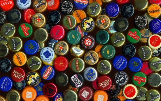 Solve Beer Bottle Caps jigsaw puzzle online with 96 pieces