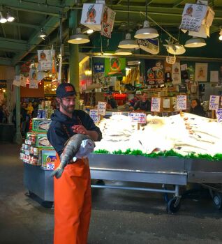 Solve An amusing tradition at the Pike Place Market in Seattle: fish ...