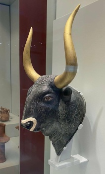 Solve Stone bull's-head rhyton, left side of head and horns restored ...