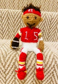 Solve Patrick Mahomes Football Doll jigsaw puzzle online with 70 pieces