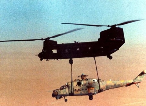 Solve MH-47 Chinook carrying a captured Libyan Mi-25 during operation ...