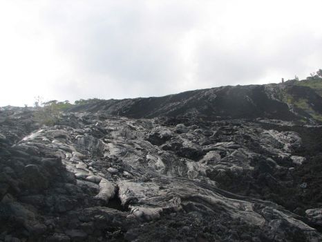 Solve DRIED LAVA FLOW jigsaw puzzle online with 63 pieces