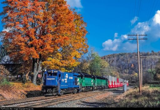 Solve Westbound NYS&W Sea-Land stack train NTV-9 crests the grade at Gulf Summit, New York on a ...
