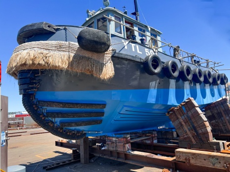 Solve A small tug under repair at the Point Hope Maritime shipyard in ...