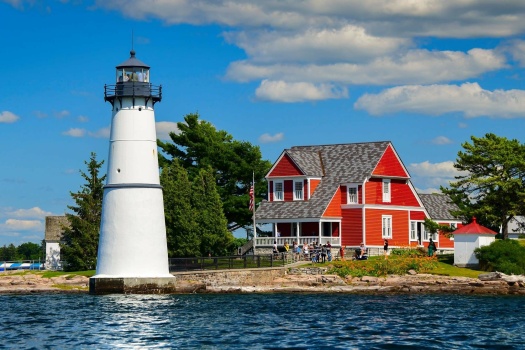Solve Lighthouse and Cottage jigsaw puzzle online with 216 pieces